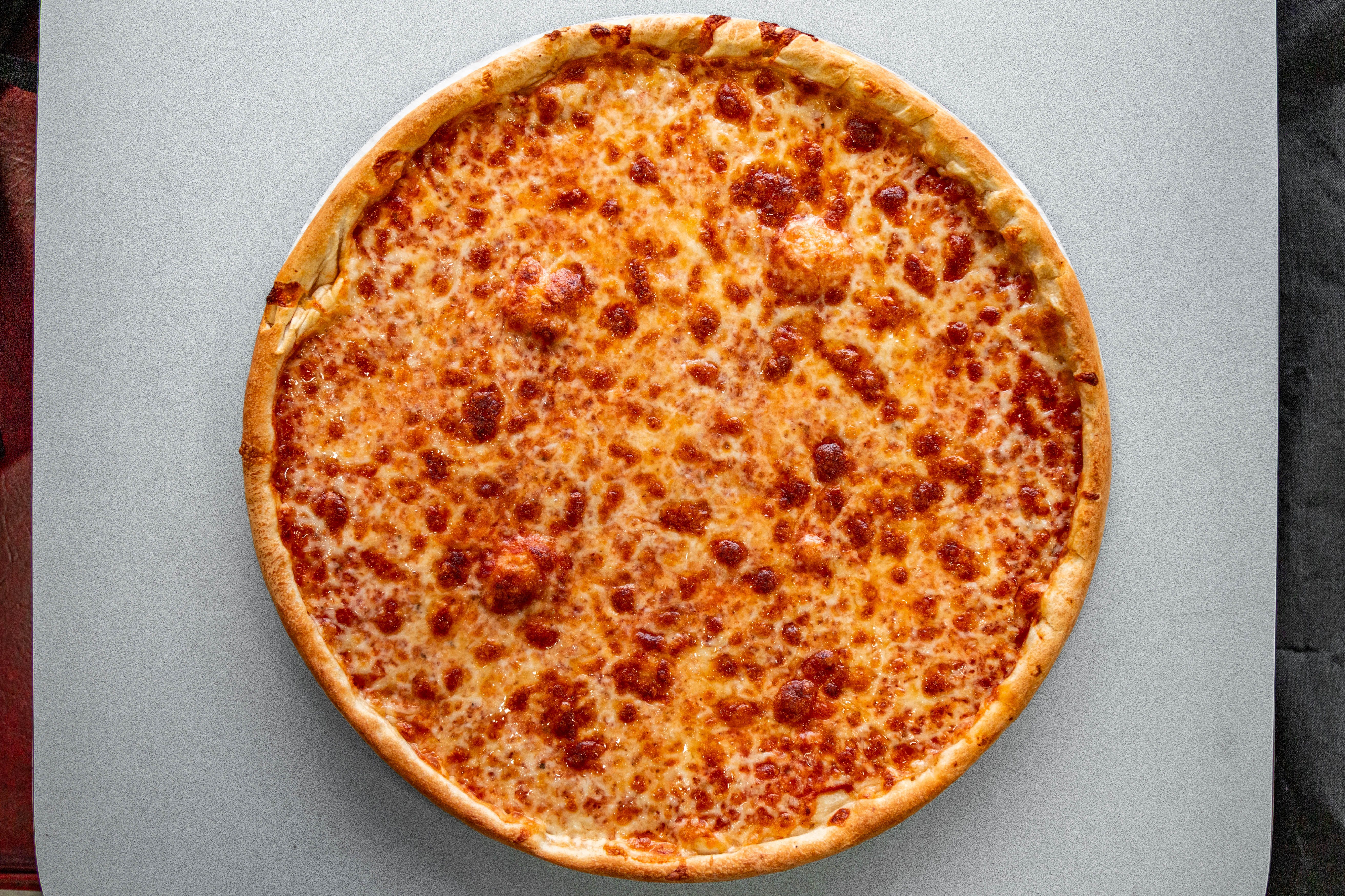 Village pizza near me store